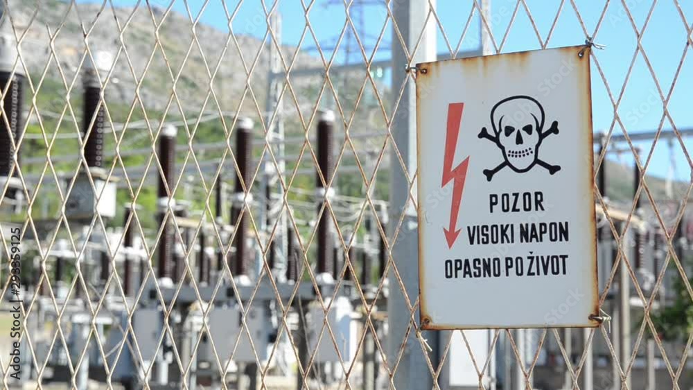 Danger of death from electricity electrocution sign near power plant ...