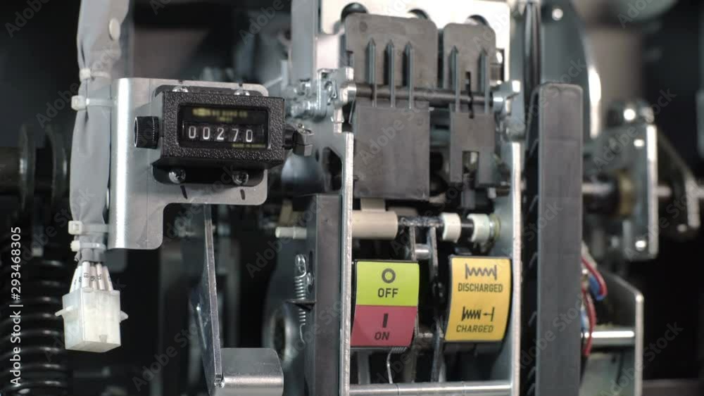 The electrician switch on the circuit breakers and starts the system ...