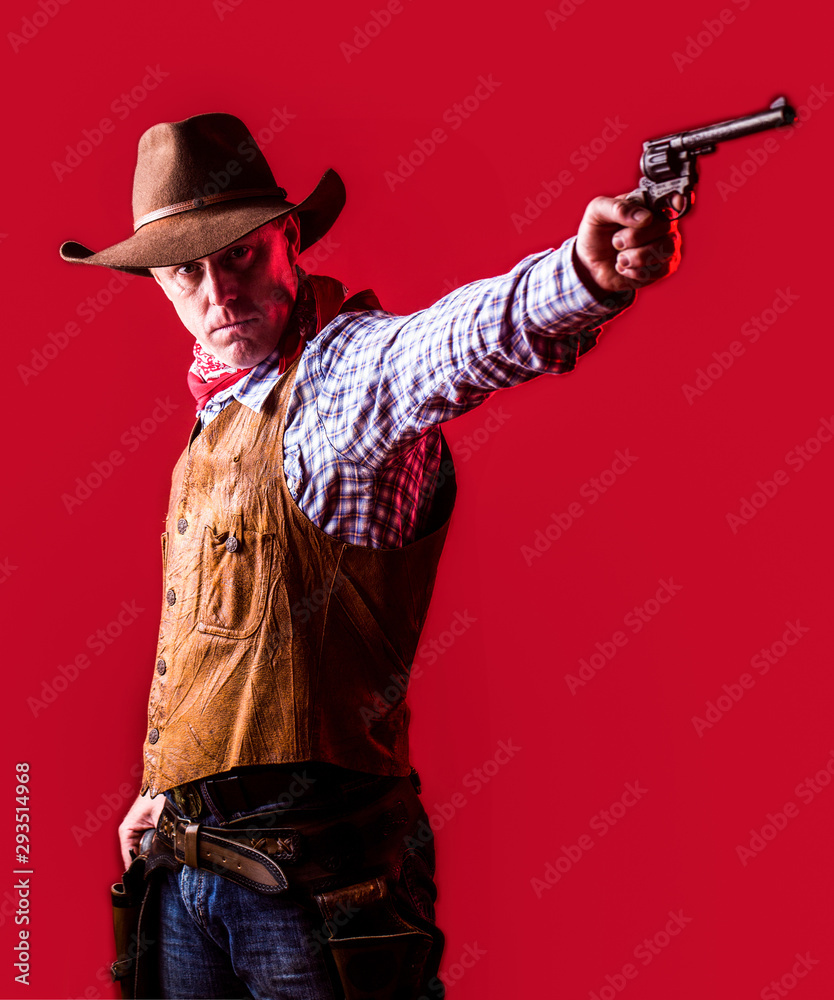 Man wearing cowboy hat, gun. West, guns. Portrait of a cowboy. American ...