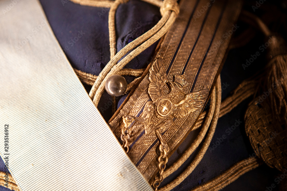 Close up picture of the old Italian military uniform with the golden ...