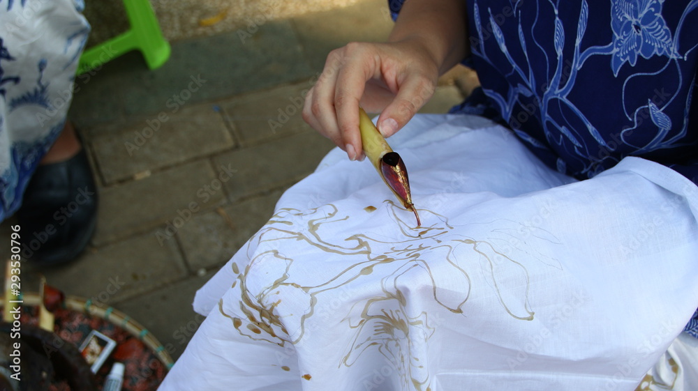 process of making batik painting at Batik Seno Yogyakarta. Create and ...