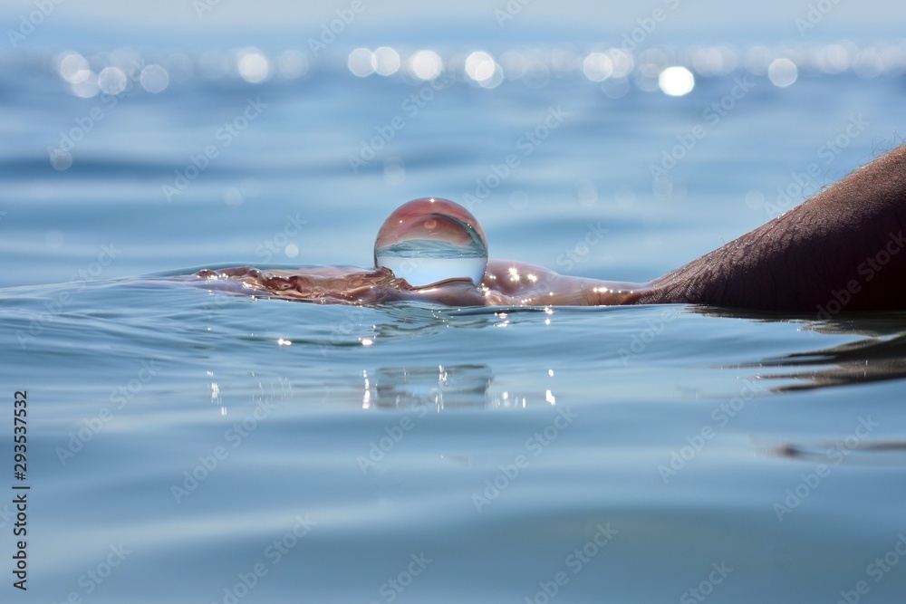 Beautiful summer coast seen through a blue glass ball/ Blue freedom ...