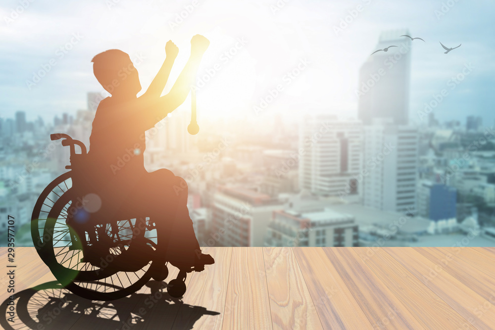 Disabled person silhouette winners hand holding gold medal top of ...