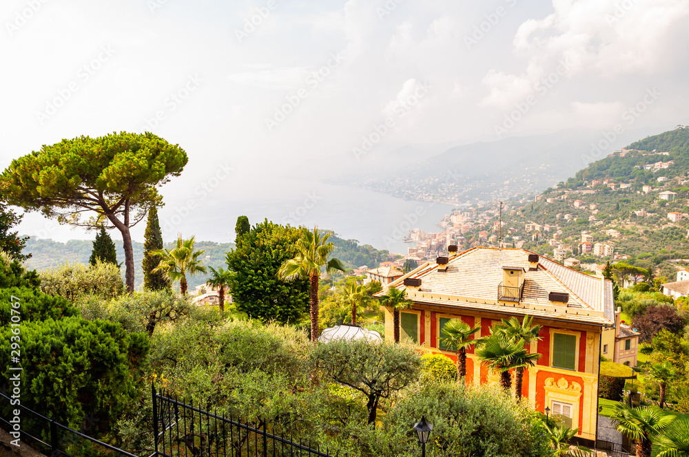 Foggy panoramic view of Ligurian coastline landscape. Graduated green ...