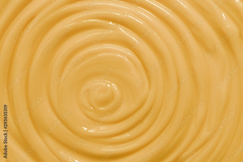 Mustard yellow swirl cream texture. Beautiful background of ...
