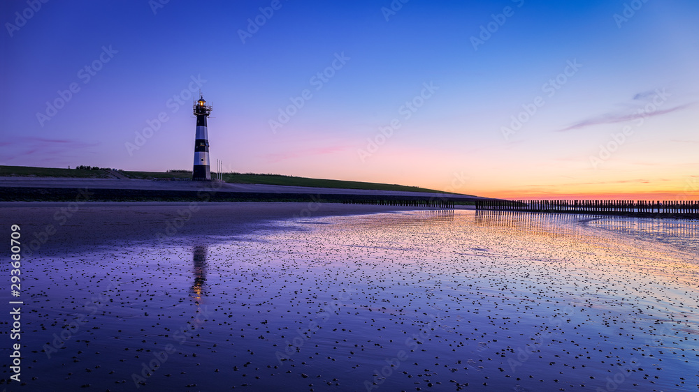 Lighthouse Nieuwe Sluis in the dutch village Breskens Stock Photo ...