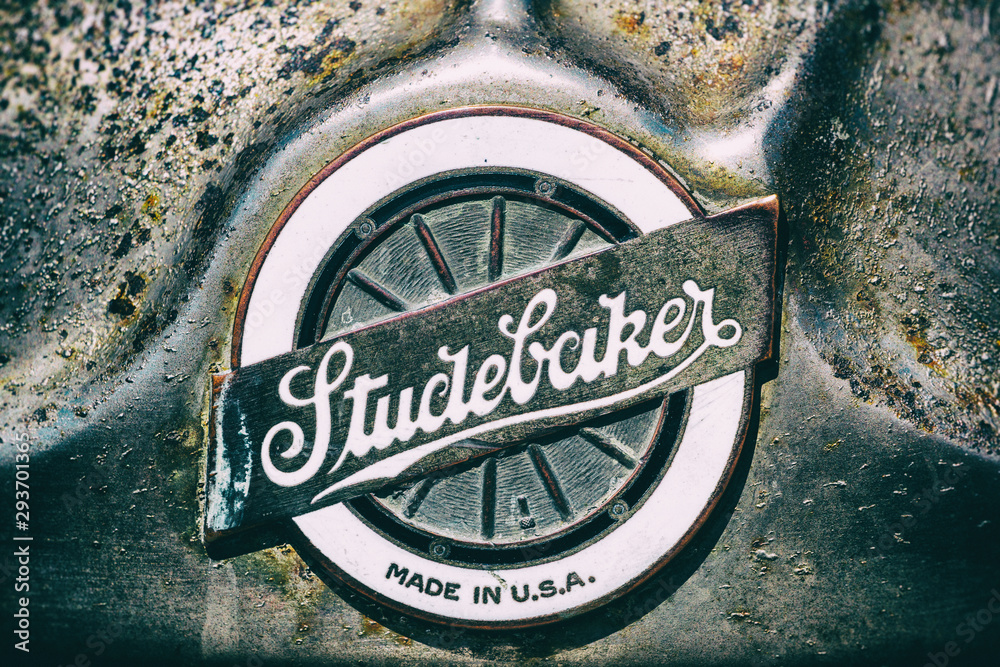The emblem on the front of a classic Studebaker automobile. Stock Photo ...