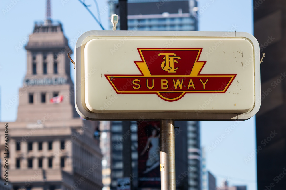 Sign indicating the entrance to the Toronto subway. Located on King ...