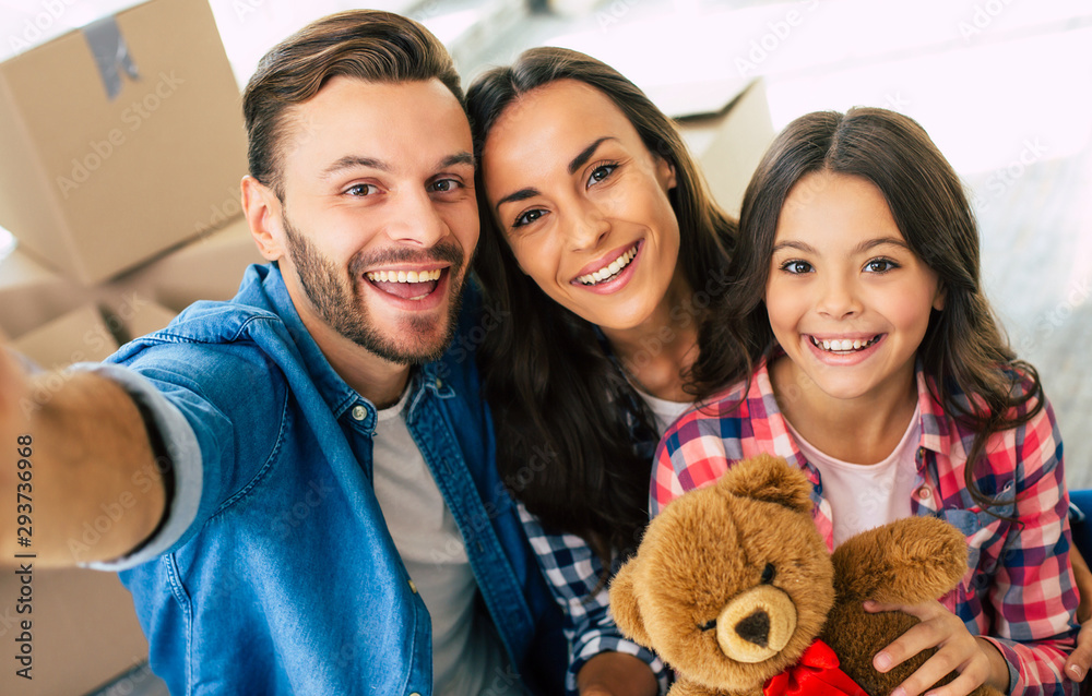 Smile, my dear! Close up photo, joyful family is taking selfie together ...