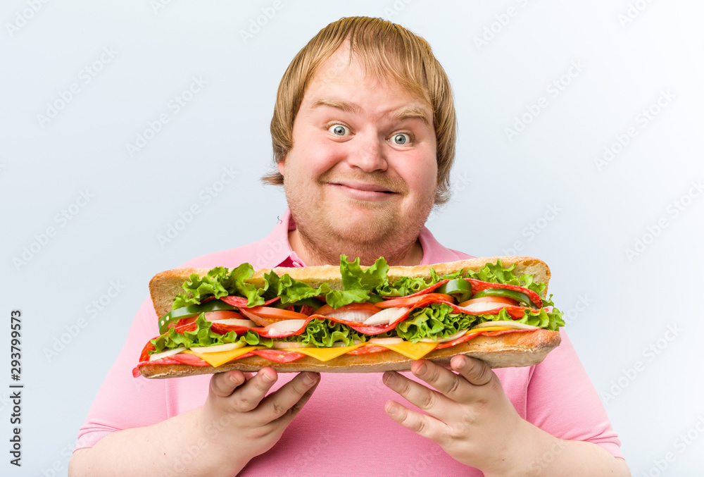 Caucasian crazy blond fat man holding a giant sandwich Stock Photo ...