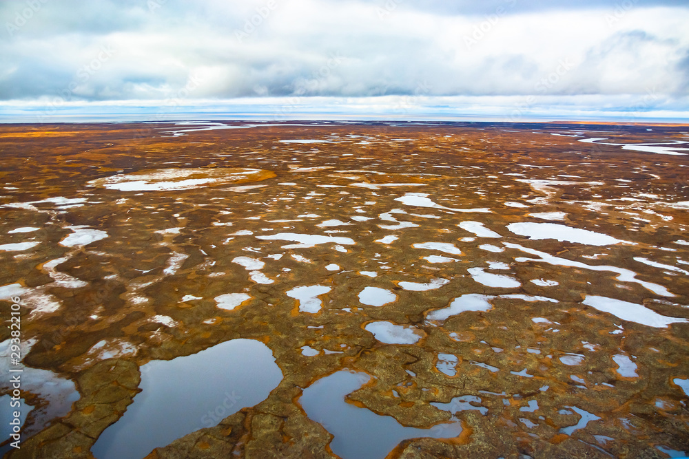 Photographing from a helicopter in the Arctic. Autumn nature landscape ...