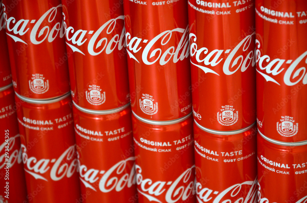 Coca-Cola logo printed on aluminium cans and placed on shopping mall ...