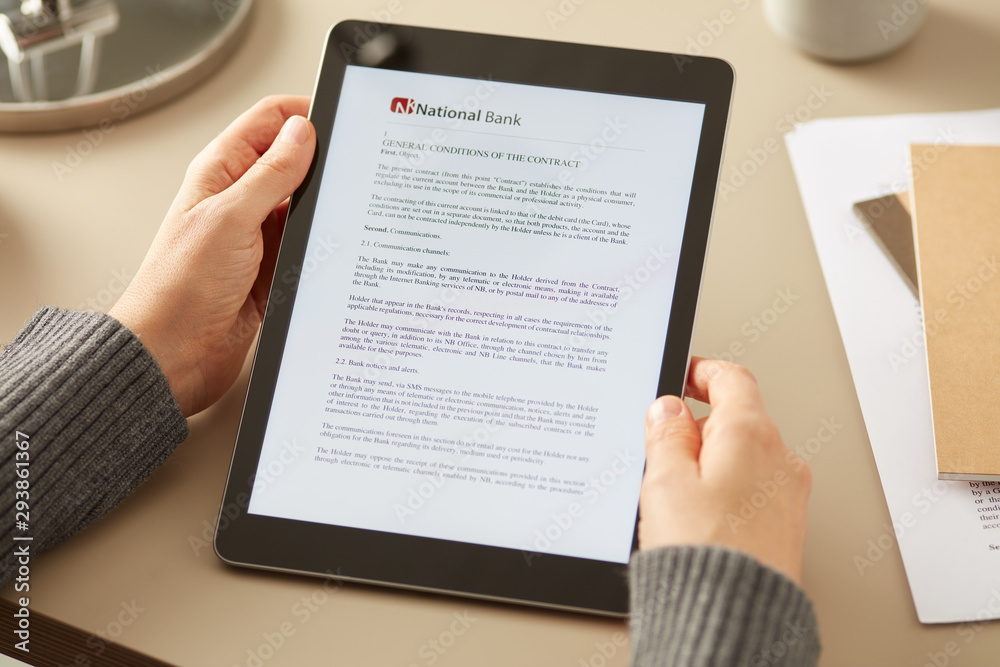 Client reading agreement contract of bank Stock Photo | Adobe Stock