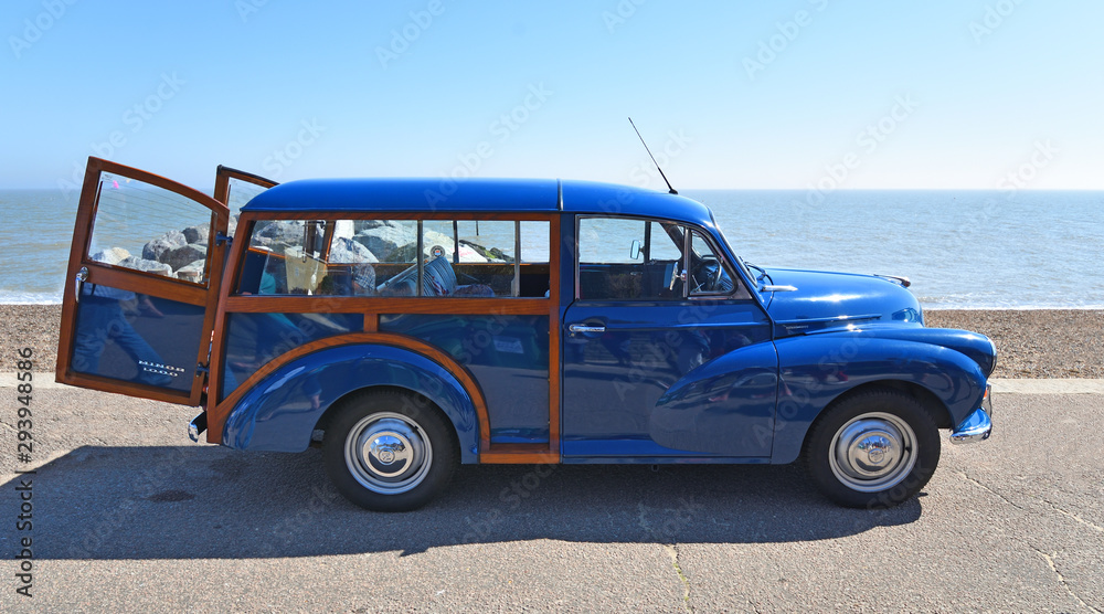 Classic Blue Morris Minor 1000 Traveller Parked on seafront Promenade ...