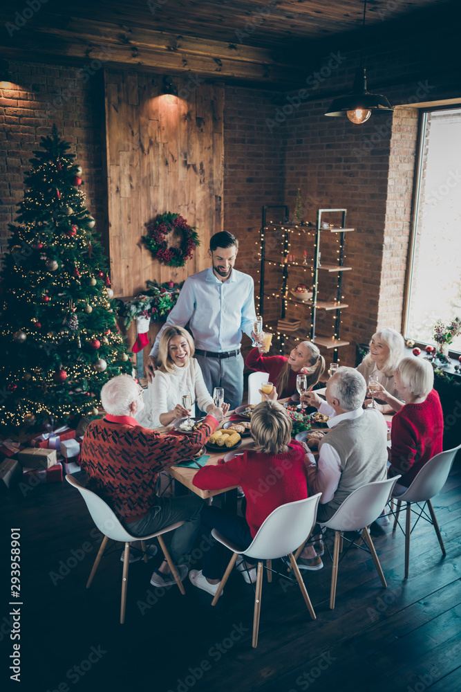 Vertical photo of big eight members family sit dinner table father guy ...