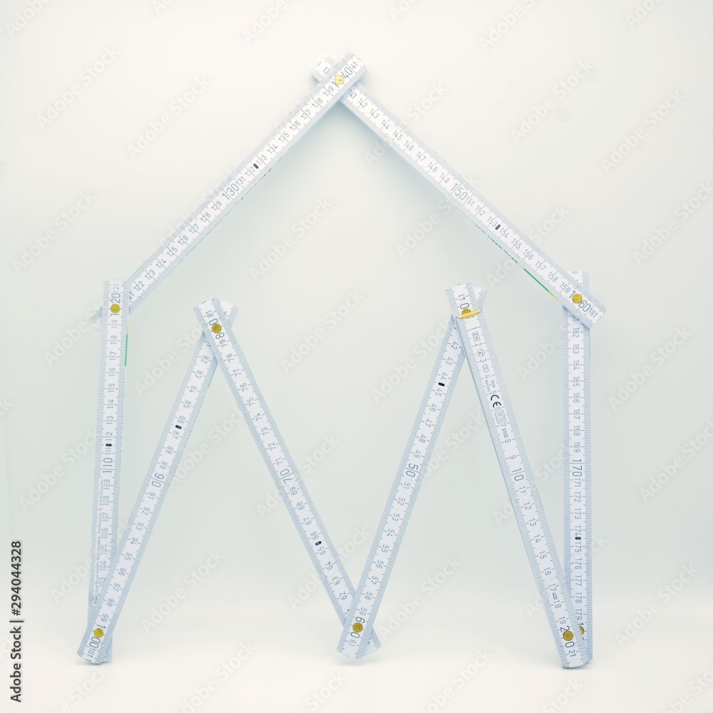 Metro de carpintero abierto de diferentes formas Stock Photo | Adobe Stock