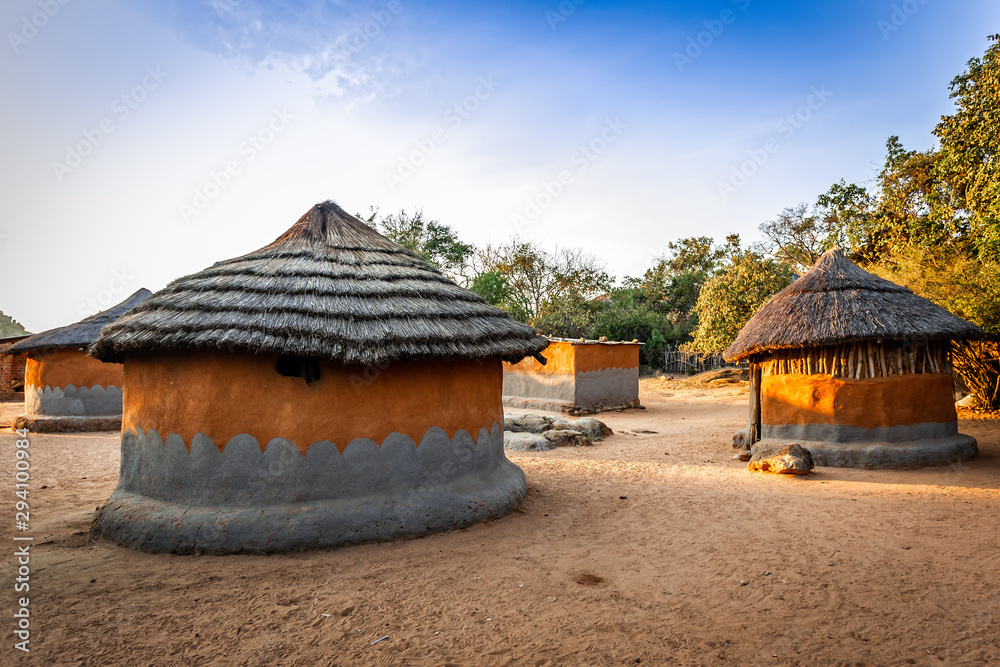 Local village with traditional zimbabwian huts from clay and hay ...