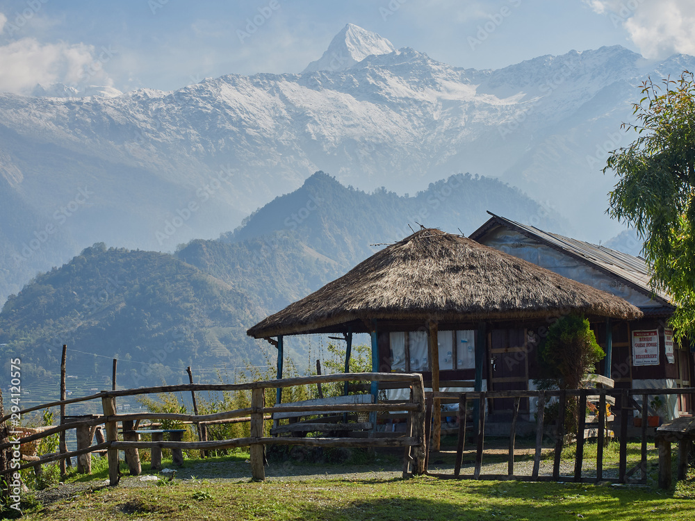 Veranda with thatched roof on background rice terraces and peaks of ...