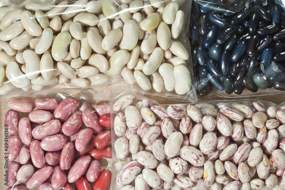 Many beans are sorted by type and packaged in transparent packages ...