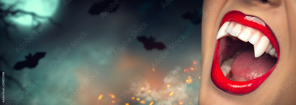 Vampire Teeth, Woman's red bloody lips close-up. Vampire girl fangs ...