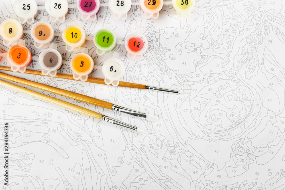 Drawing by numbers on canvas or cardboard. Stock Photo | Adobe Stock