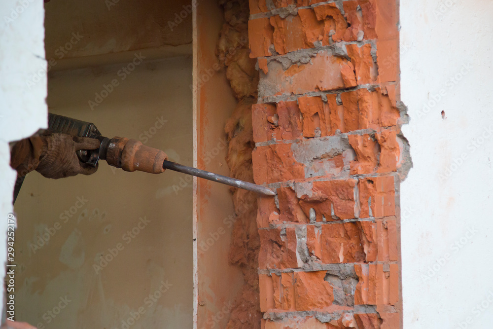 Jackhammer. The use of a jackhammer in construction works. Stock Photo ...