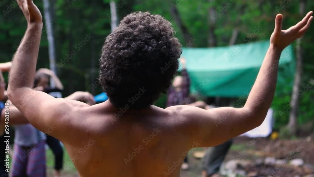 Diverse people enjoy spiritual gathering A closeup and rear view of a ...