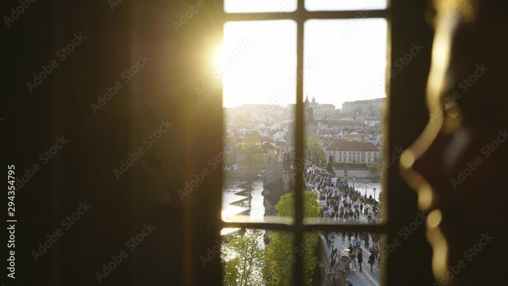 Young girl tourist exploring downtown of Prague. Lateral movement shot ...