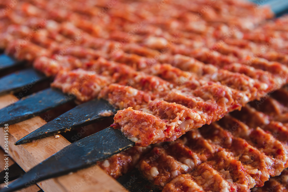 Traditional Turkish Adana Kebab or Kebap meat texture background with ...