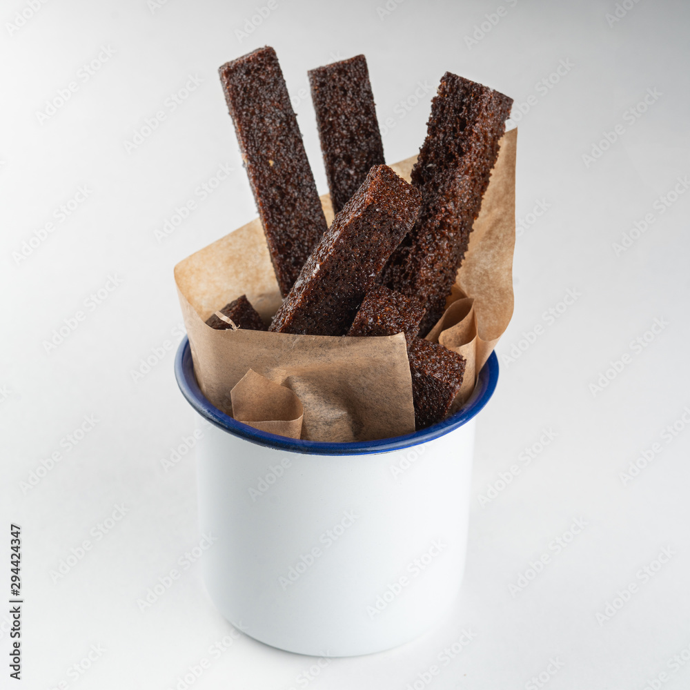 Rye bread deep fried crunchy sticks with sea salt isolated on white ...