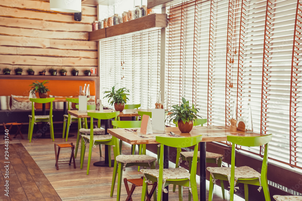 Bright cafe interior design concept in ecological natural style. Wooden ...