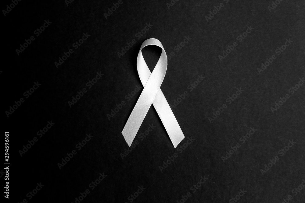 Lung cancer awareness ribbon on black background. November lung cancer ...