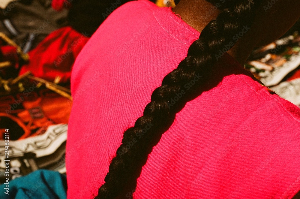 Peruvian Hairstyle, long braid on person's back Stock Photo | Adobe Stock