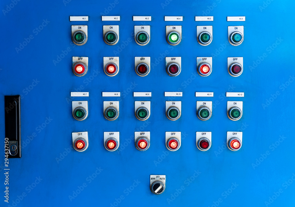 Close up view and low light. Button switch panel for on-off machines ...