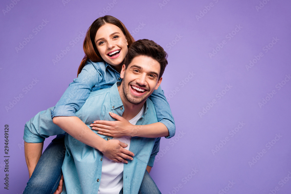 Portrait of lovely romantic couple hug piggyback feel romance playful enjoy date honeymoon wear ...