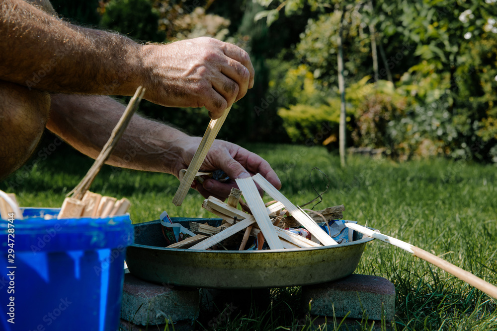 Lighting a bonfire. The concept of spending free time outdoors ...