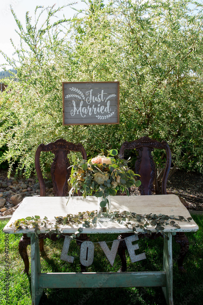 bride and groom reception sweet heart table on wedding day Stock Photo ...