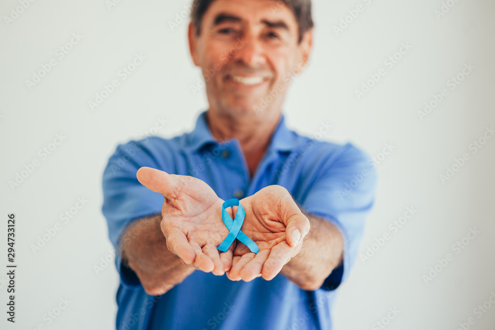 Foto de Prostate Cancer Awareness. Man with light Blue Ribbon for ...