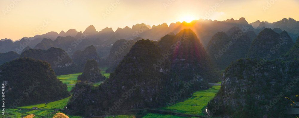 Panoramic view of Sunset with Rapeseed flower field at Wanfenglin ...