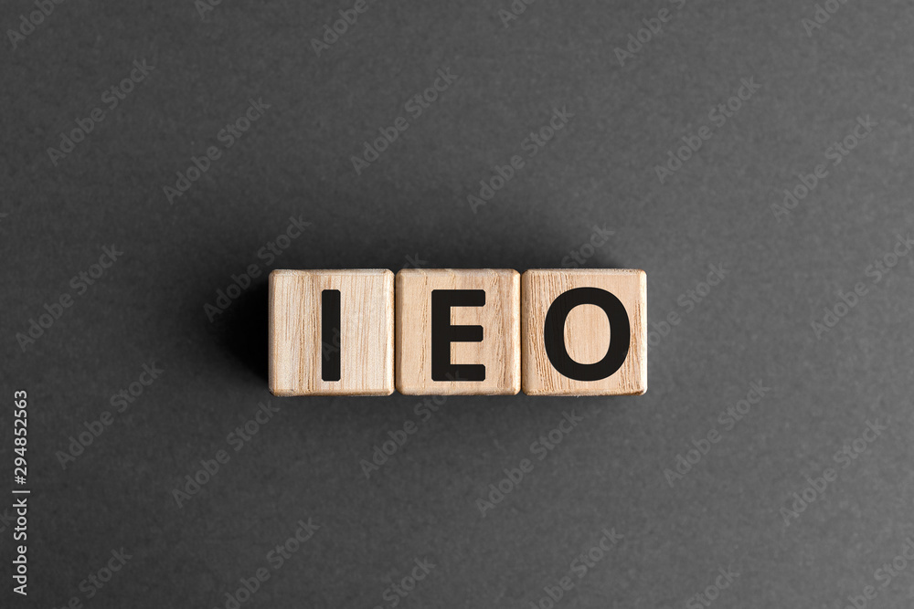 IEO - acronym from wooden blocks with letters, abbreviation IEO Initial ...