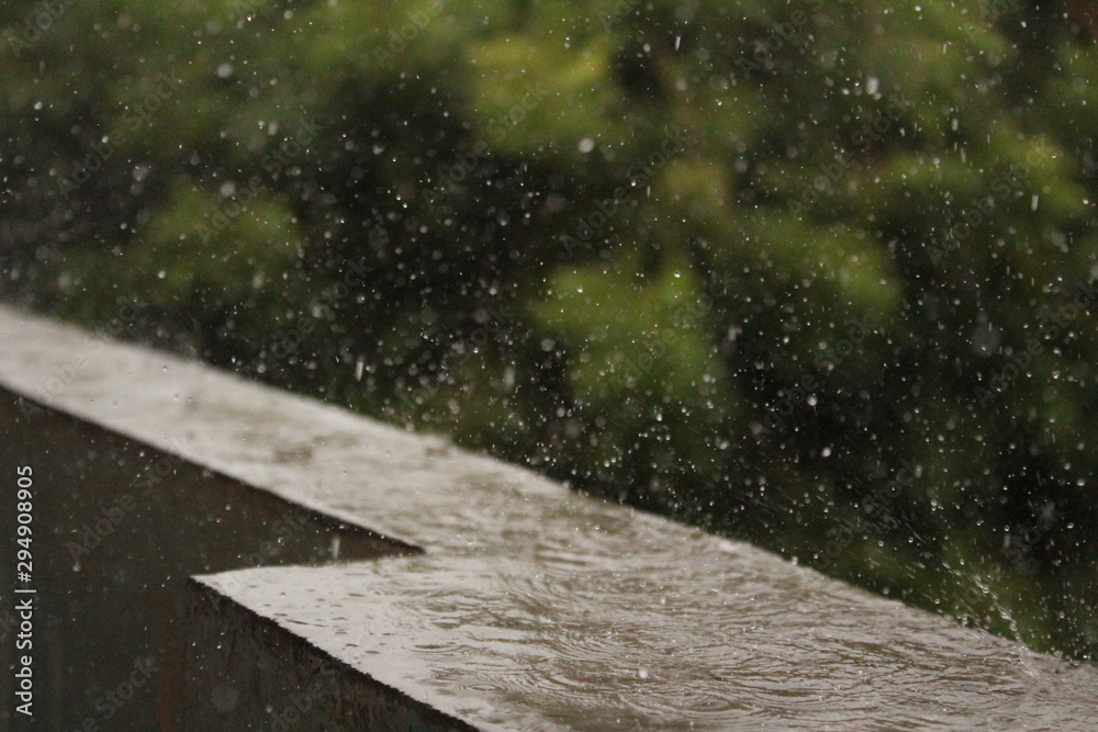 raining in the wall with rain drops Stock Photo | Adobe Stock