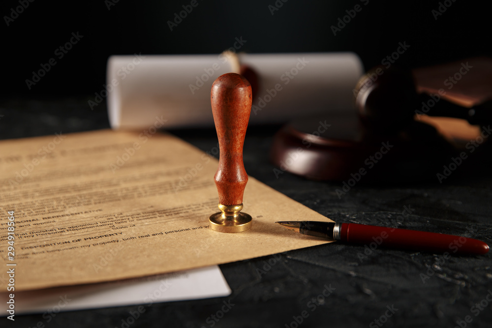 Notary's public pen and stamp on testament and last will. Notary public ...