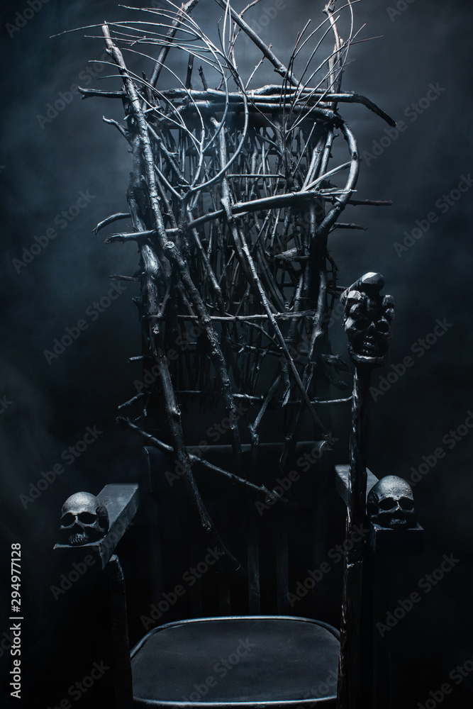 Witch evil throne with skulls and cane. Stock Photo | Adobe Stock