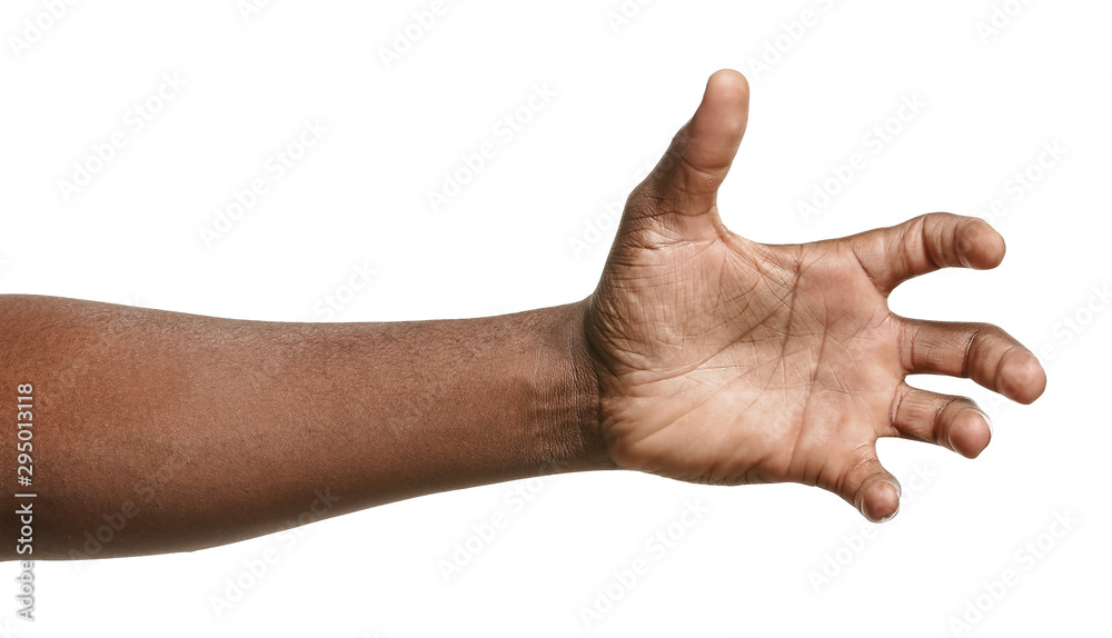 Hand of African-American man holding something on white background ...