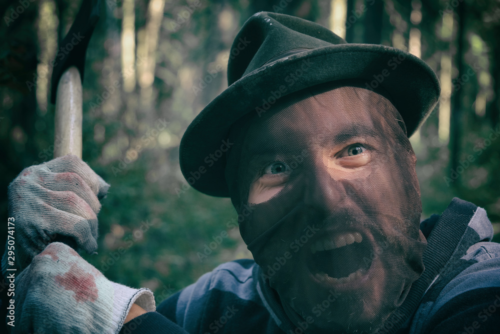 Serial maniac with axe in forest, bloody killer, murderer, mad man in ...