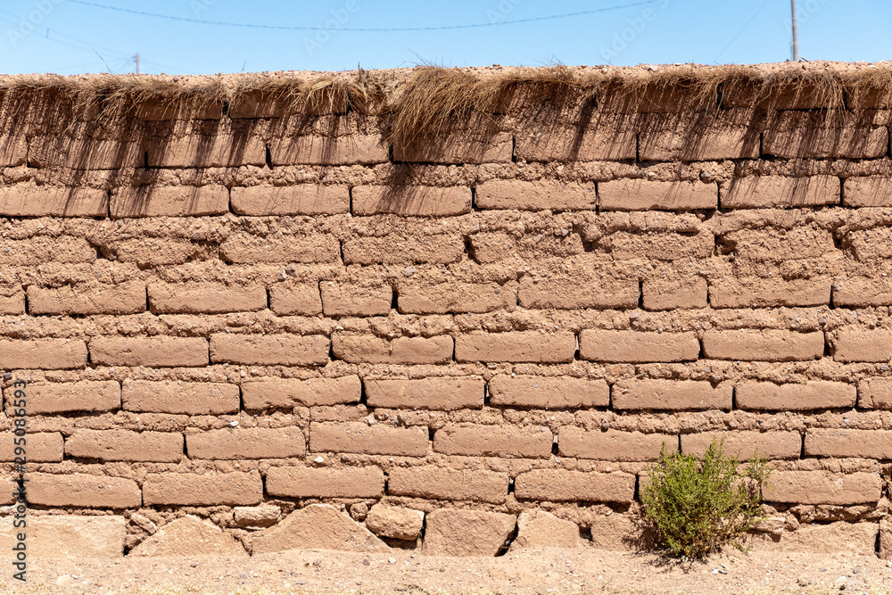 Brick wall from dry brown dirt stone typical for south America Stock ...