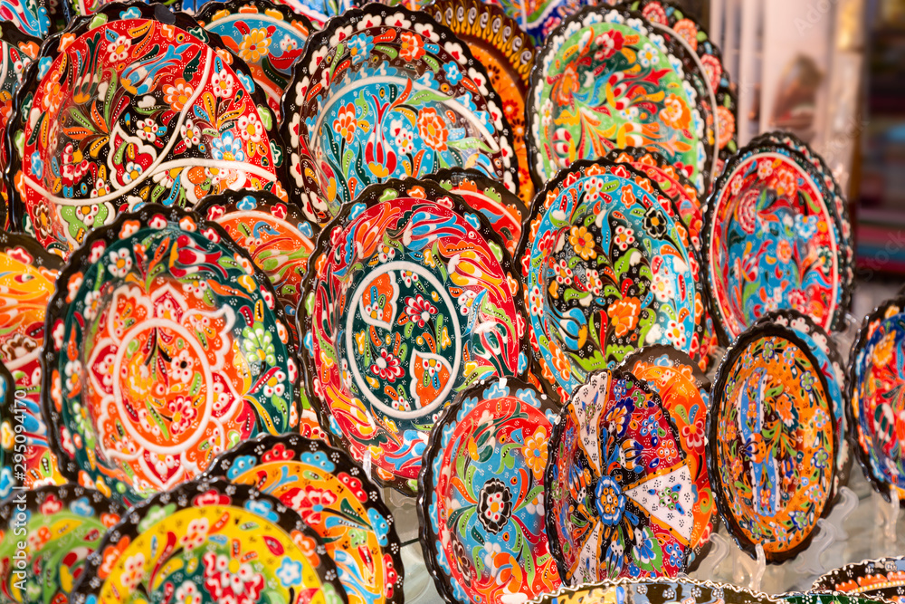 Traditional arabic colorful ceramic plates at Dubai Market souk, United ...