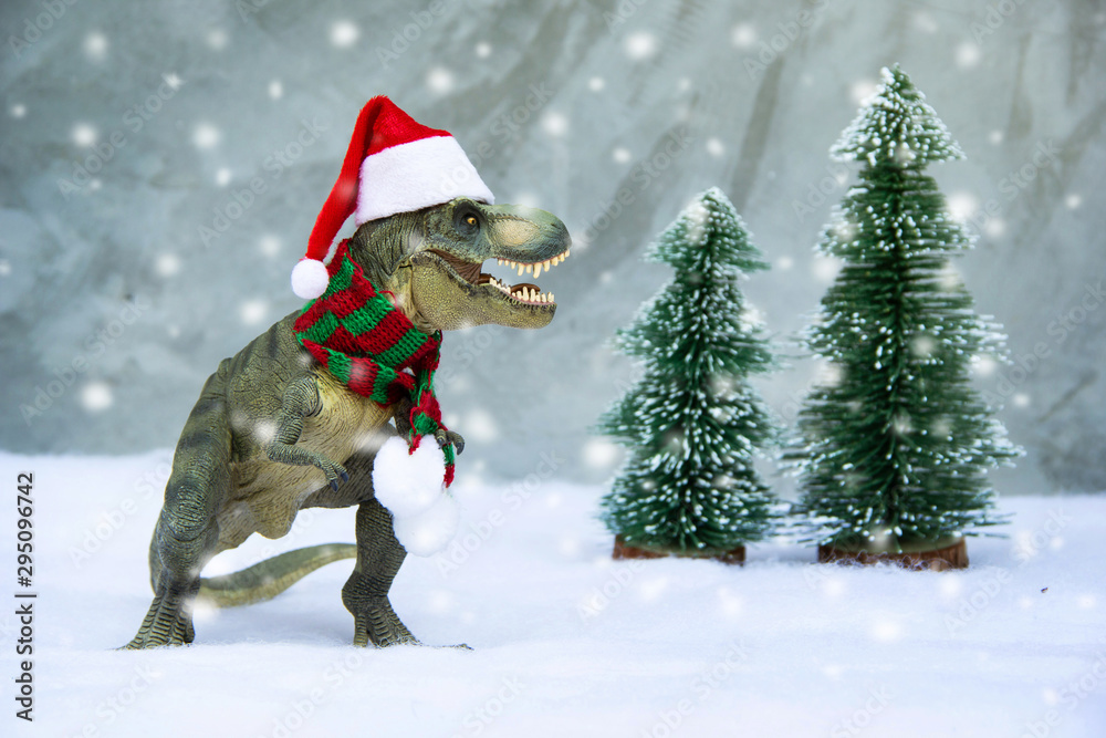 Poster Dinosaur Tyrannosaurus rex ( t-rex ) wearing a Santa Claus hat ...