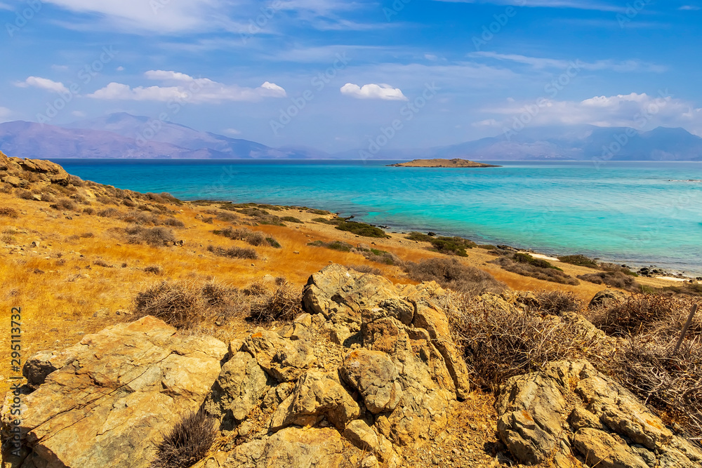 picturesque rocks in savannah with beautiful golden gtass on a coast ...