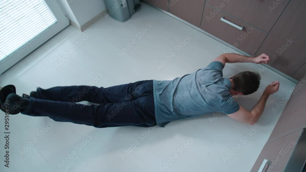 Man on floor kicking have a Tantrum 4K. Top wide view of a person in ...